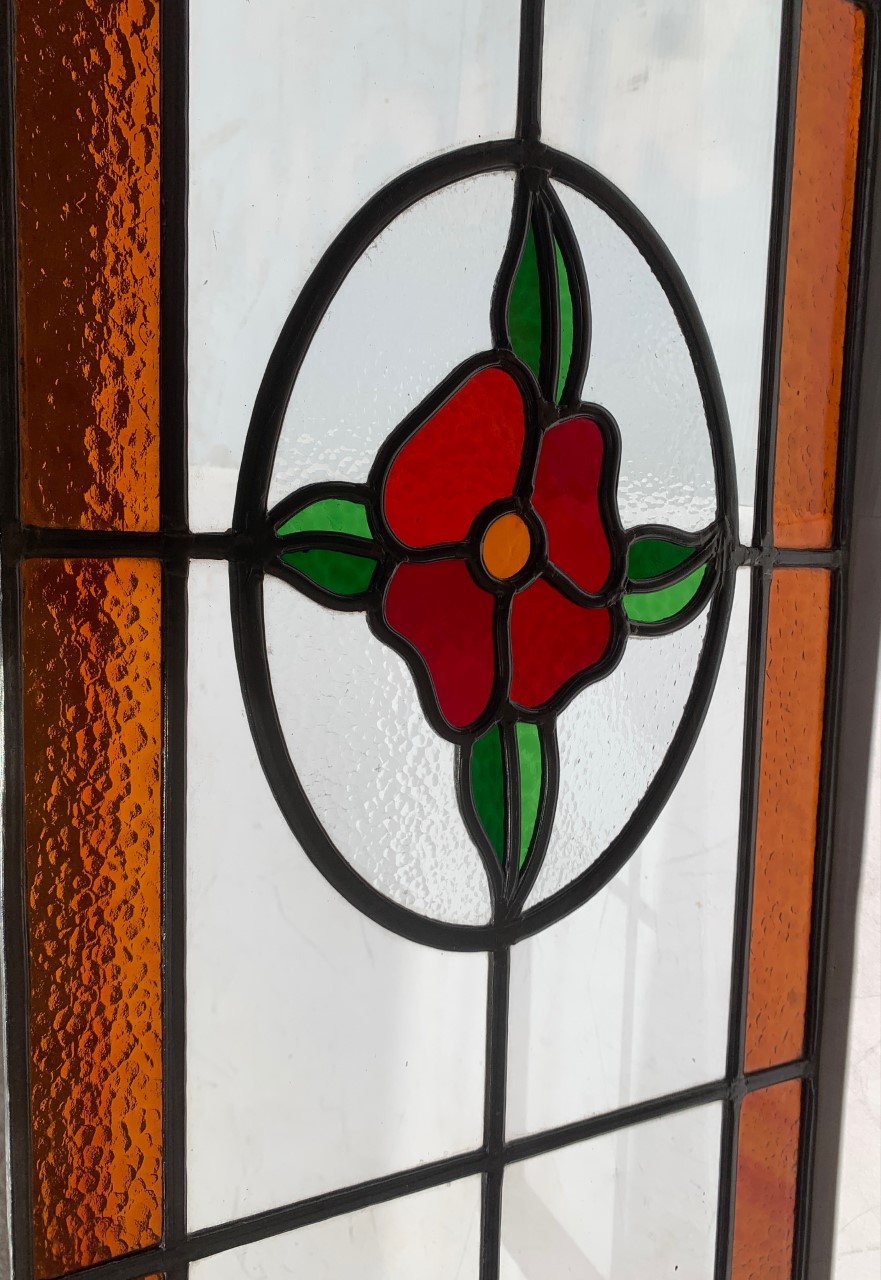 detail of Red flower leadlight panel with clear glass with amber border ...
